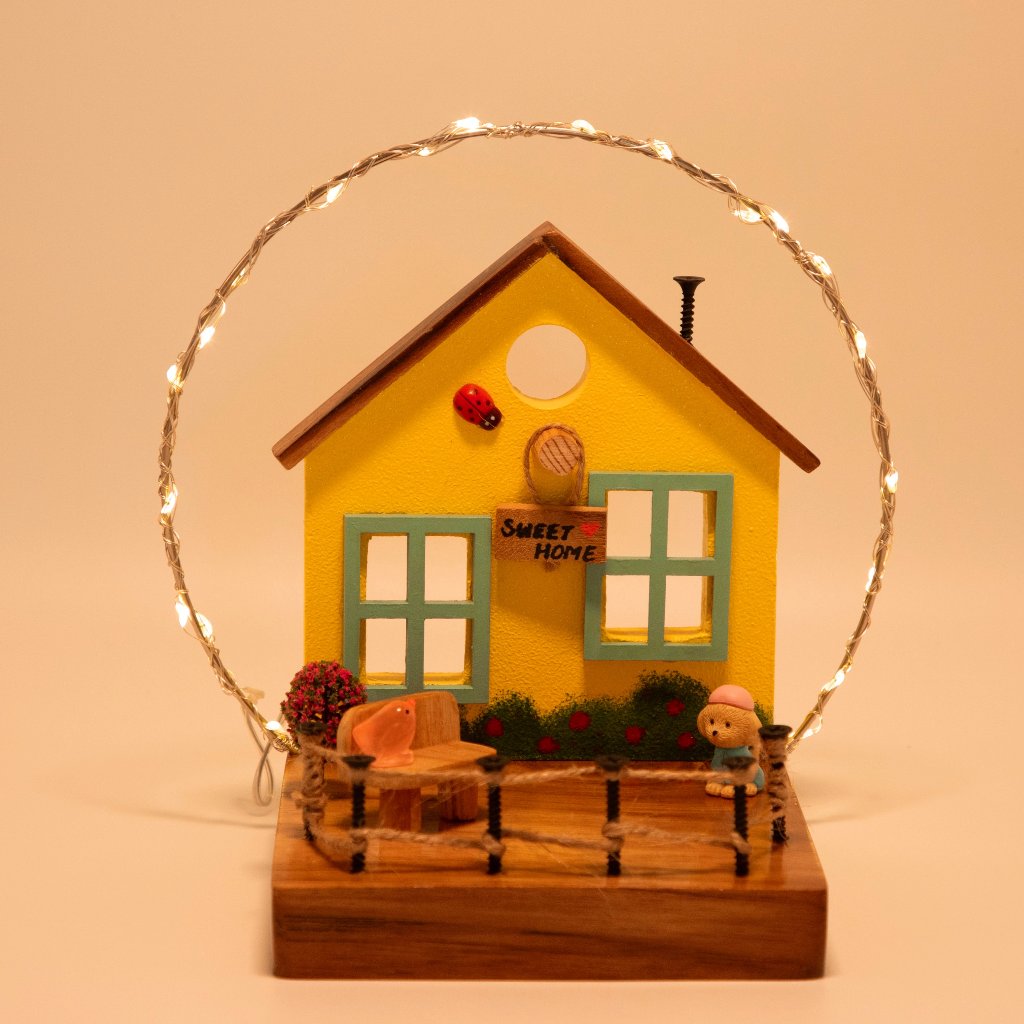 Yellow Cottage With String Lights Decor